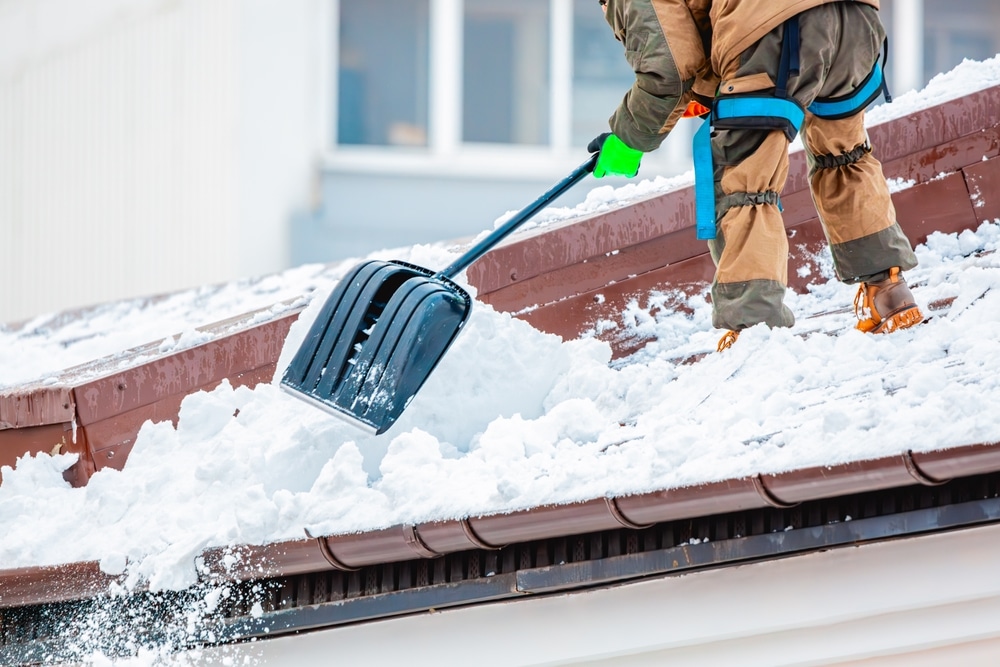 Snow & Ice Removal: Protecting Your Roof During Harsh Winters